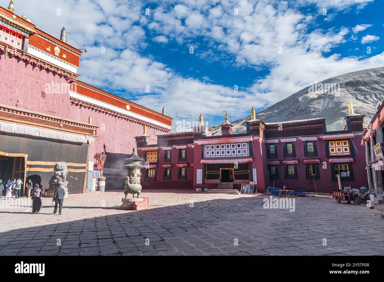 Explore the iconic red, gray, and white facade of Sakya Monastery in ...