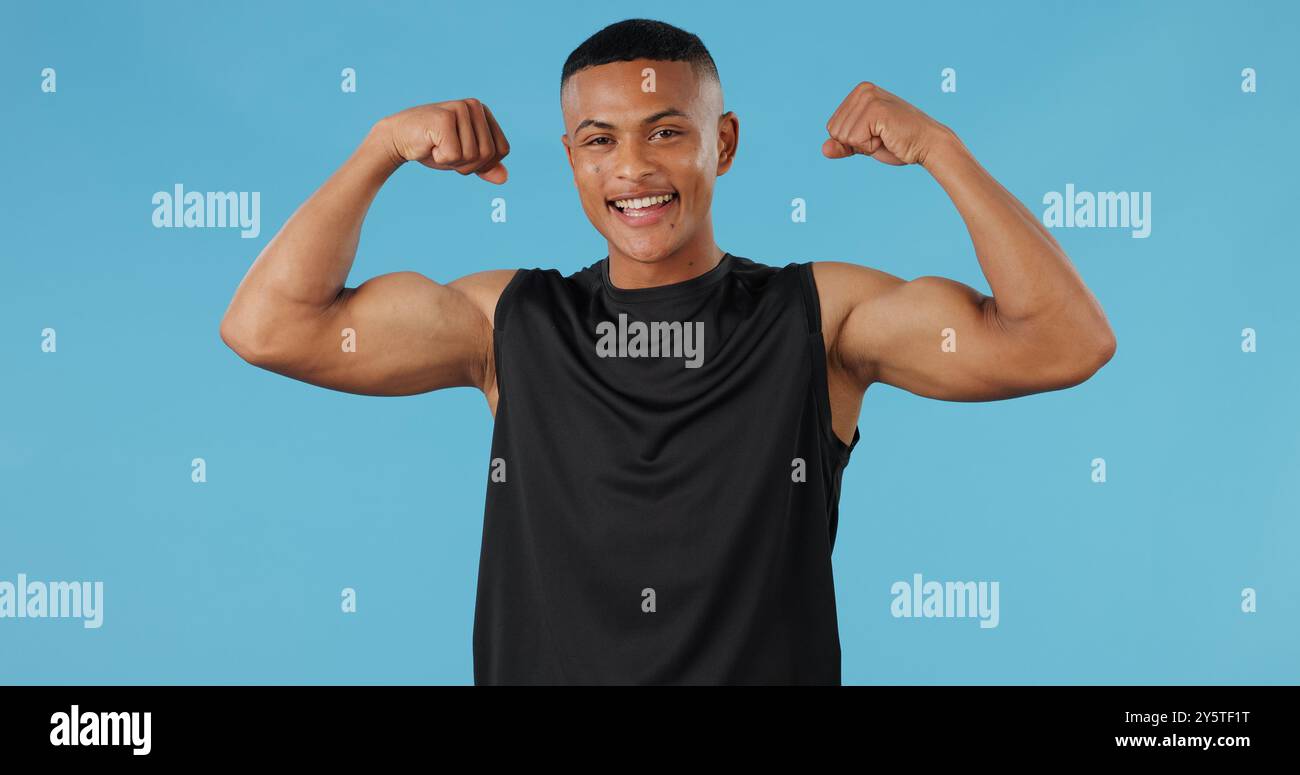 Black man, flex arms and portrait in studio for growth, muscle or fitness by blue background ...