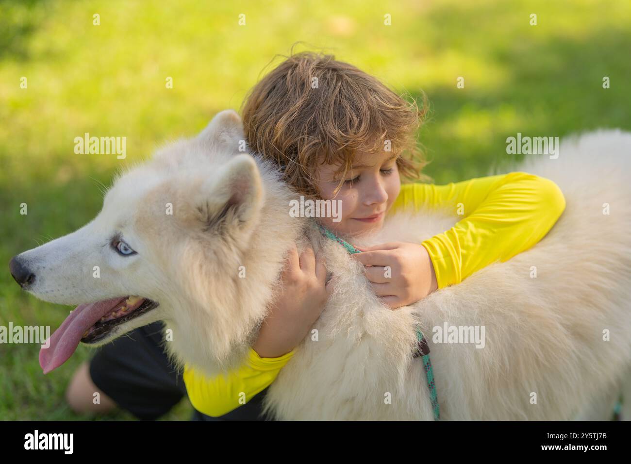 Kid and dog outdoor portrait. Kids friend. Kid hugging dog in the ...