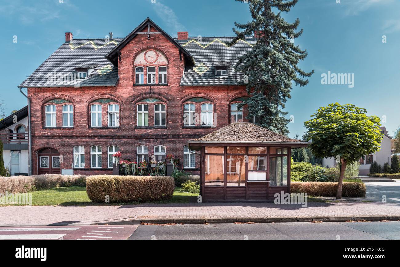 Historic brick tenement house European architecture. Small town street ...