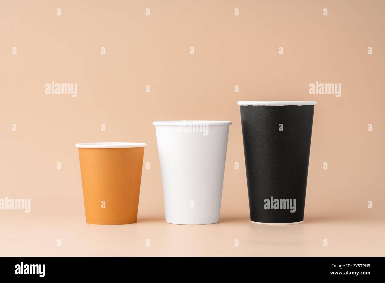 Paper cups stacked on a neutral background for a visually appealing ...