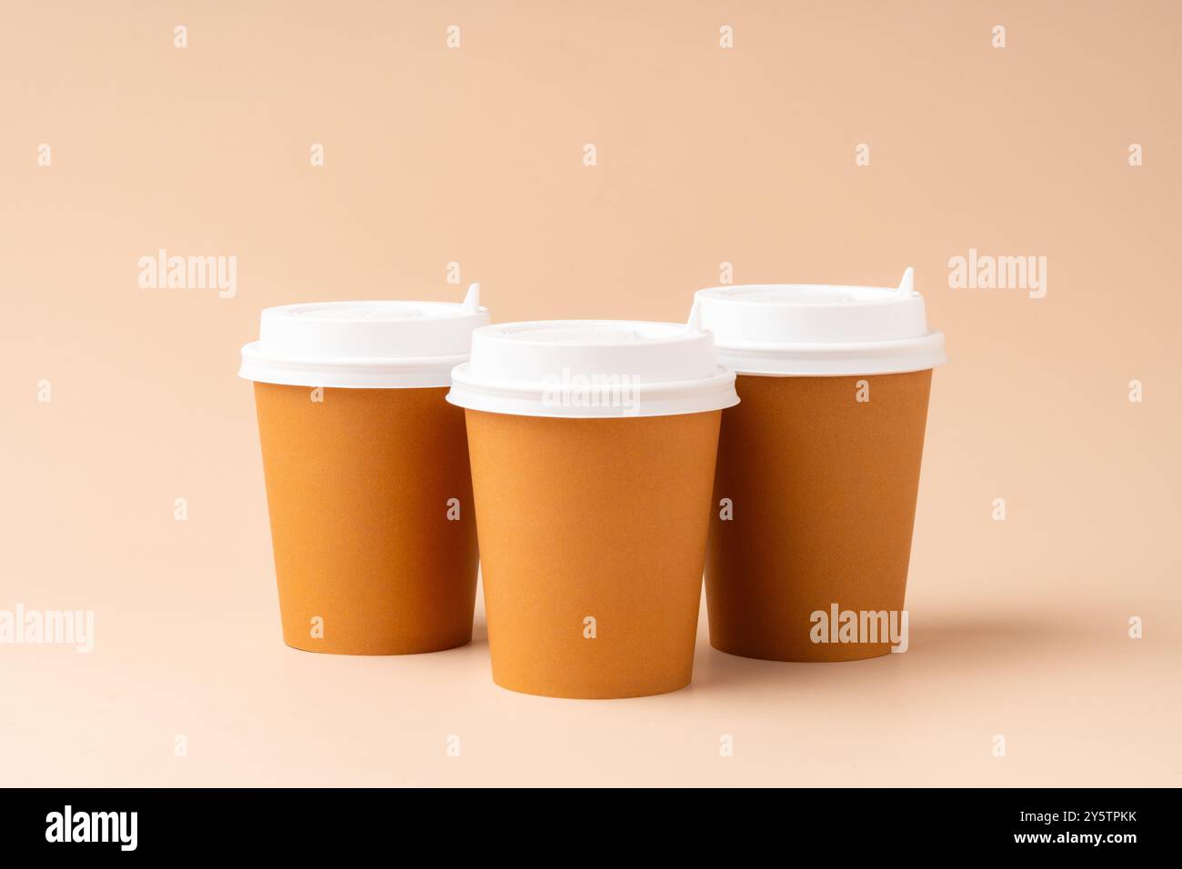 Paper cups stacked on a neutral background for a visually appealing ...