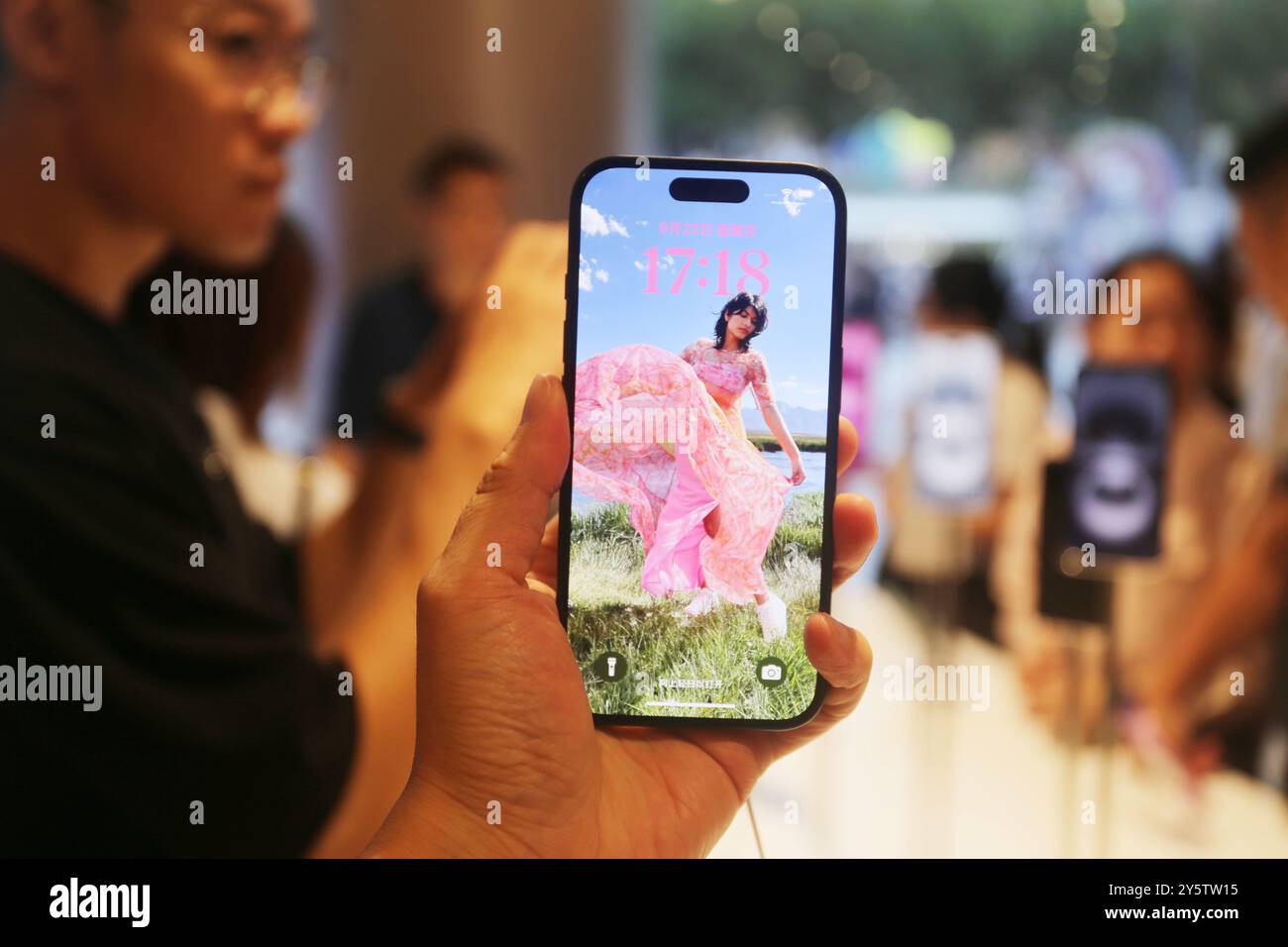 SHANGHAI, CHINA - SEPTEMBER 22, 2024 - Customers experience Apple's new ...