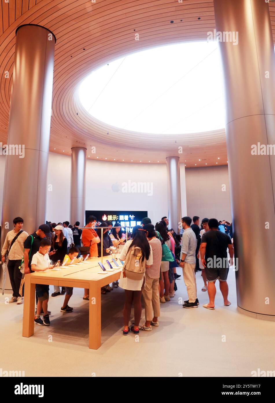 SHANGHAI, CHINA - SEPTEMBER 22, 2024 - Customers experience Apple's new ...