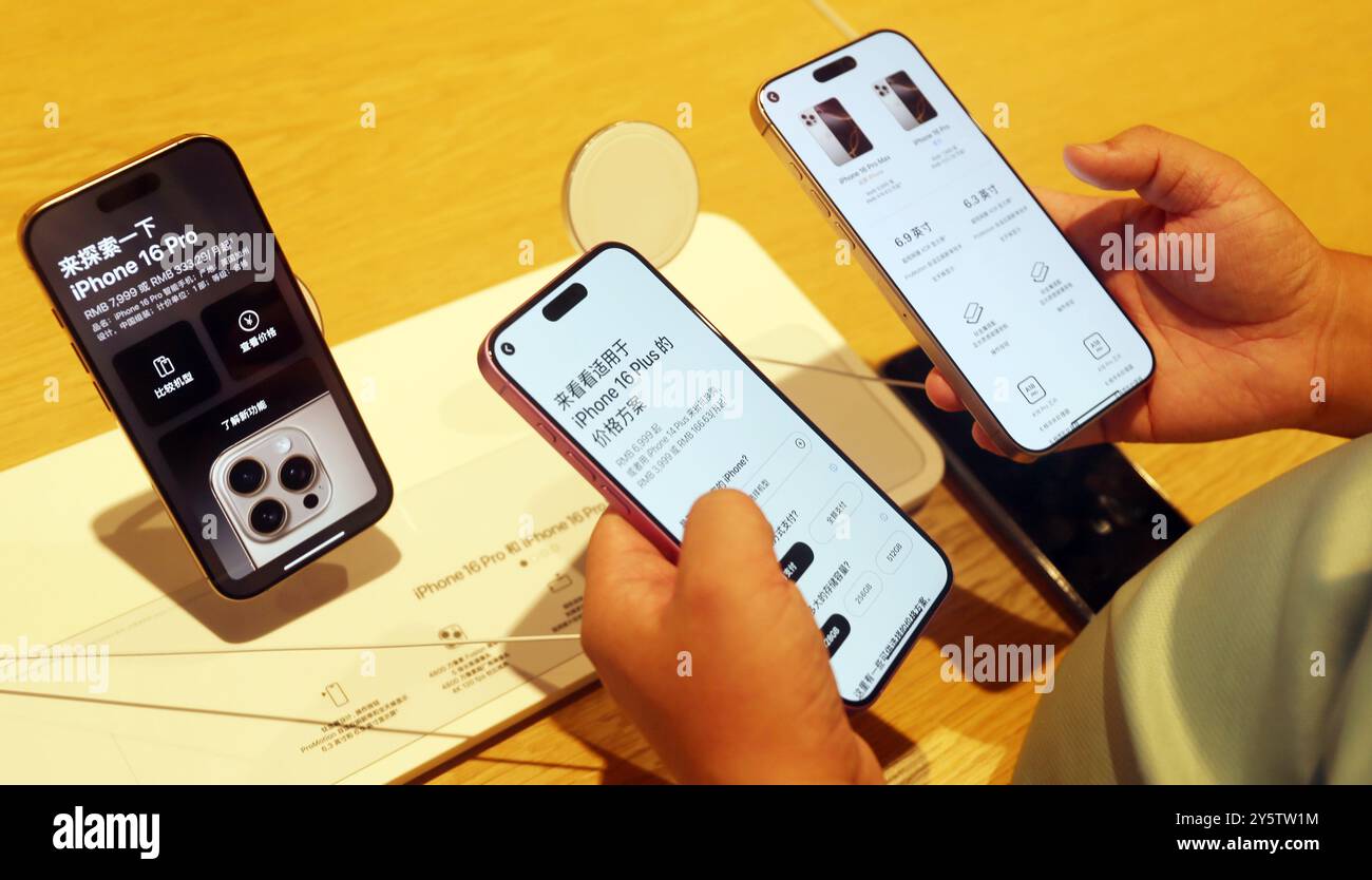SHANGHAI, CHINA - SEPTEMBER 22, 2024 - Customers experience Apple's new ...