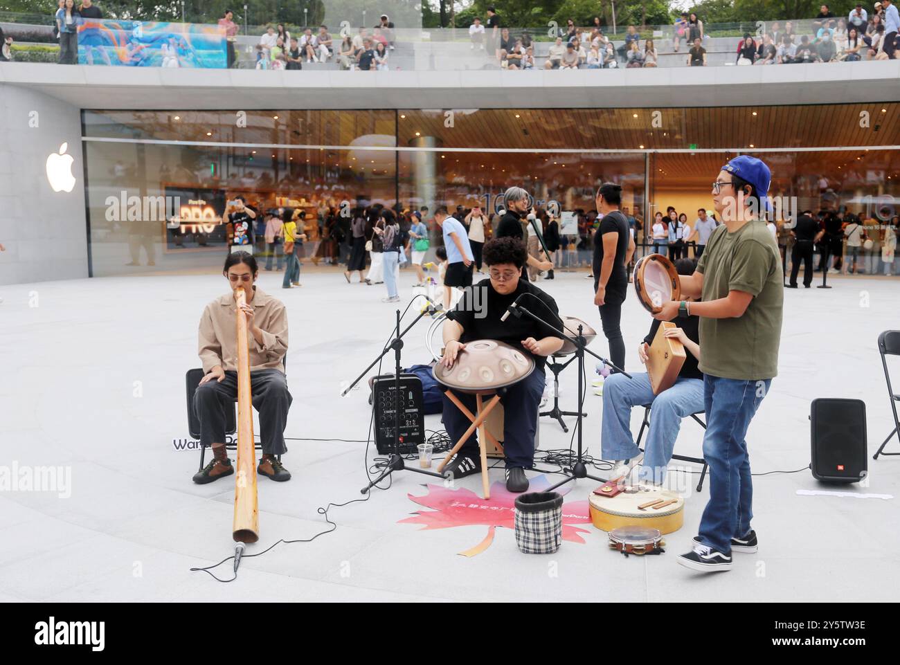 SHANGHAI, CHINA - SEPTEMBER 22, 2024 - Customers experience Apple's new ...