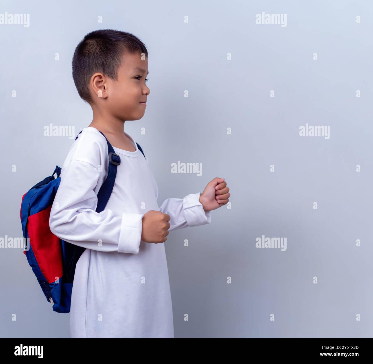 Asian cute boy wearing white and carry student backpack, Boy standing ...