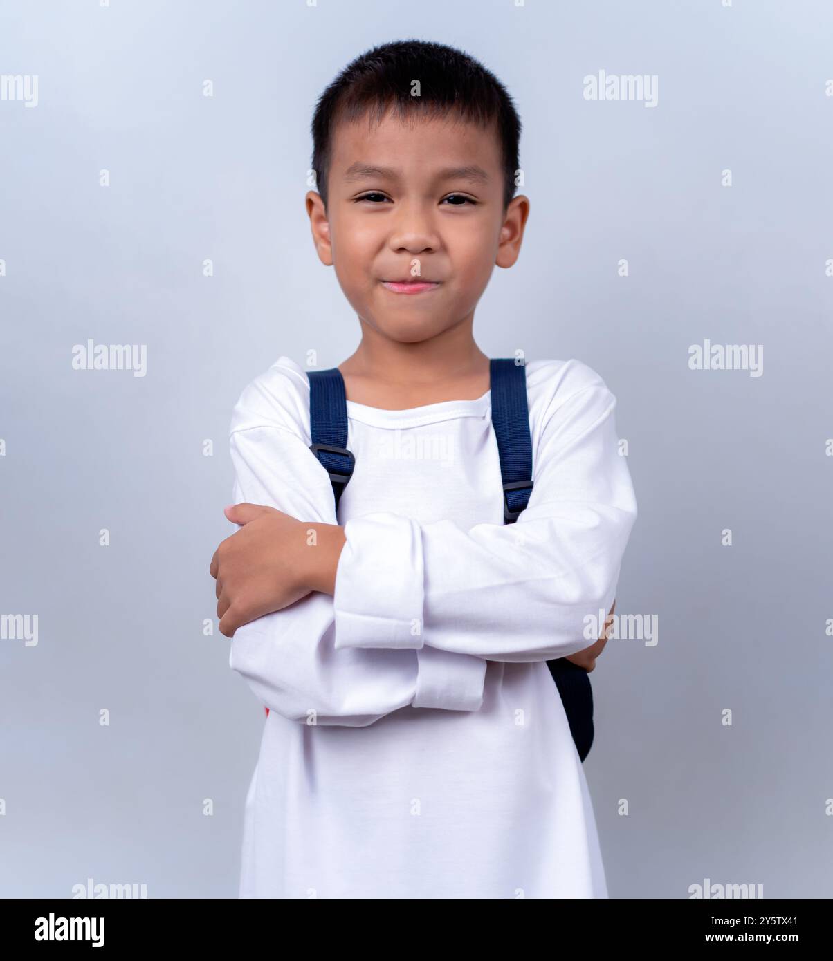 Asian cute boy wearing white and carry student backpack, Boy standing ...