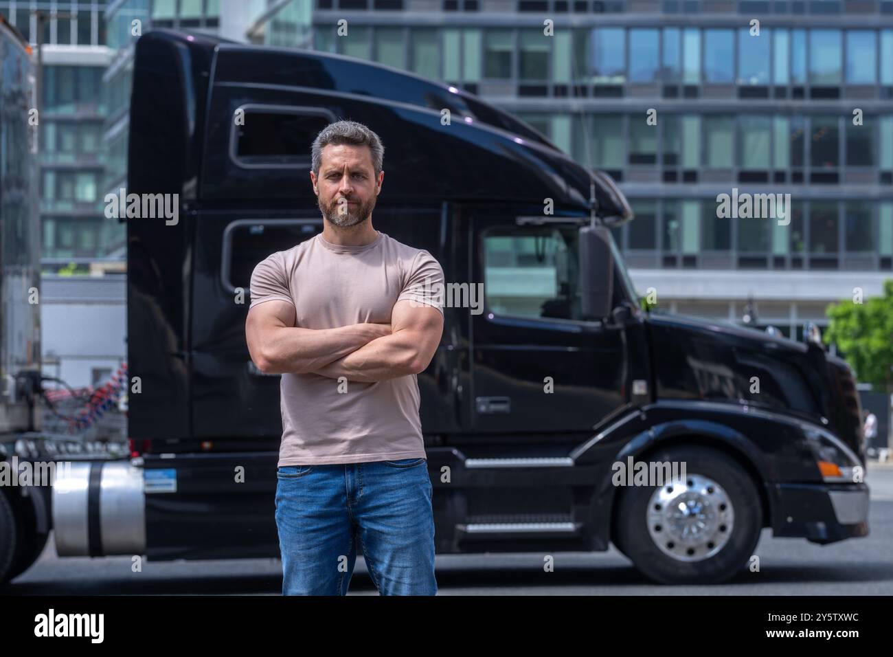 Truck driver. CDL. Portrait of trucker standing by his truck vehicle ...