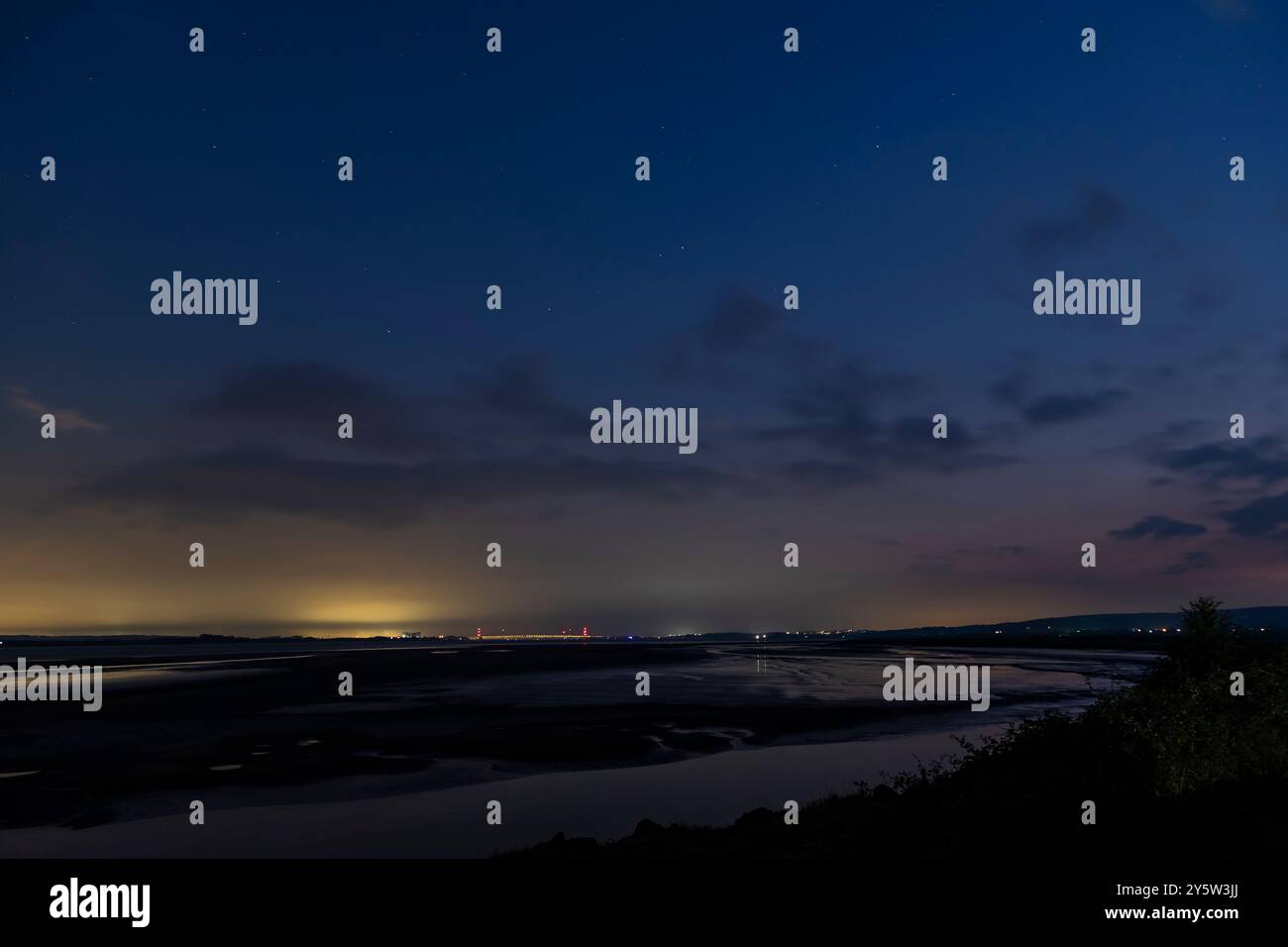 River Severn at night looking downstream toward the Bristol Channel. UK ...