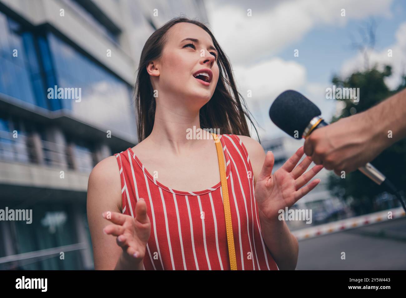 Photo of popular star girl giving interview to journalist speaking in ...