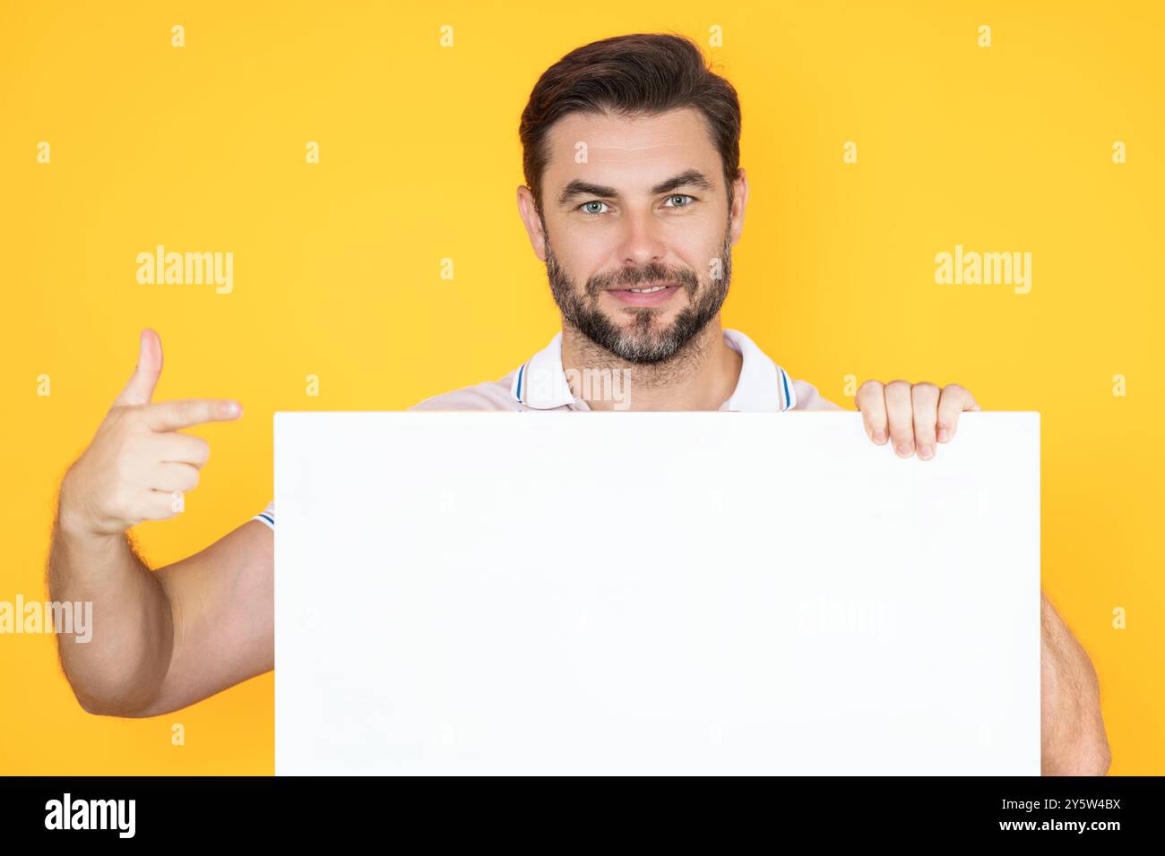 Man holds sign, blank card. Placard ready for your product. Sign to ...