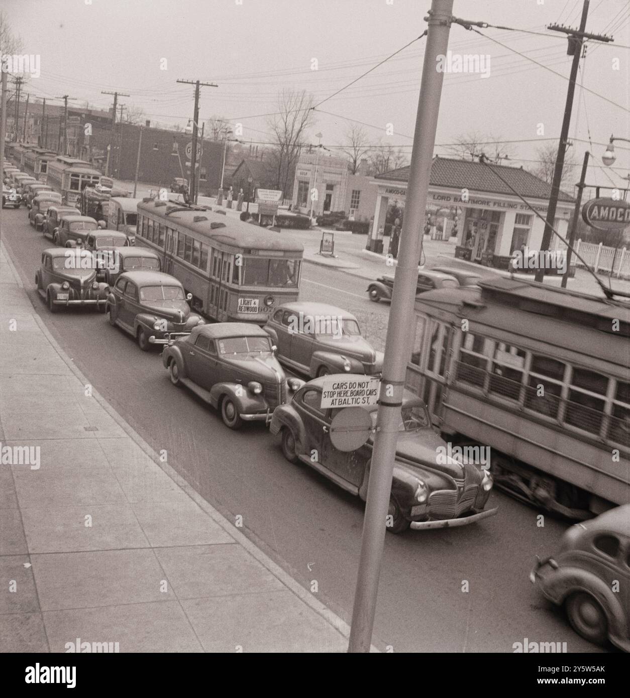 America of the 1940s. Traffic jam on the road from the Bethlehem Fairfield shipyard to Baltimore ...