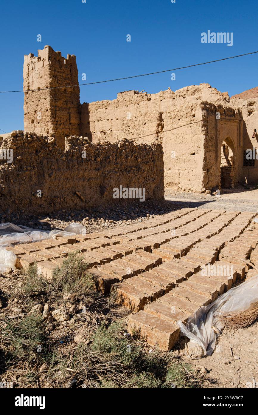 Building adobe bricks, Ifri kasbah, Ziz river valley, Atlas mountains ...