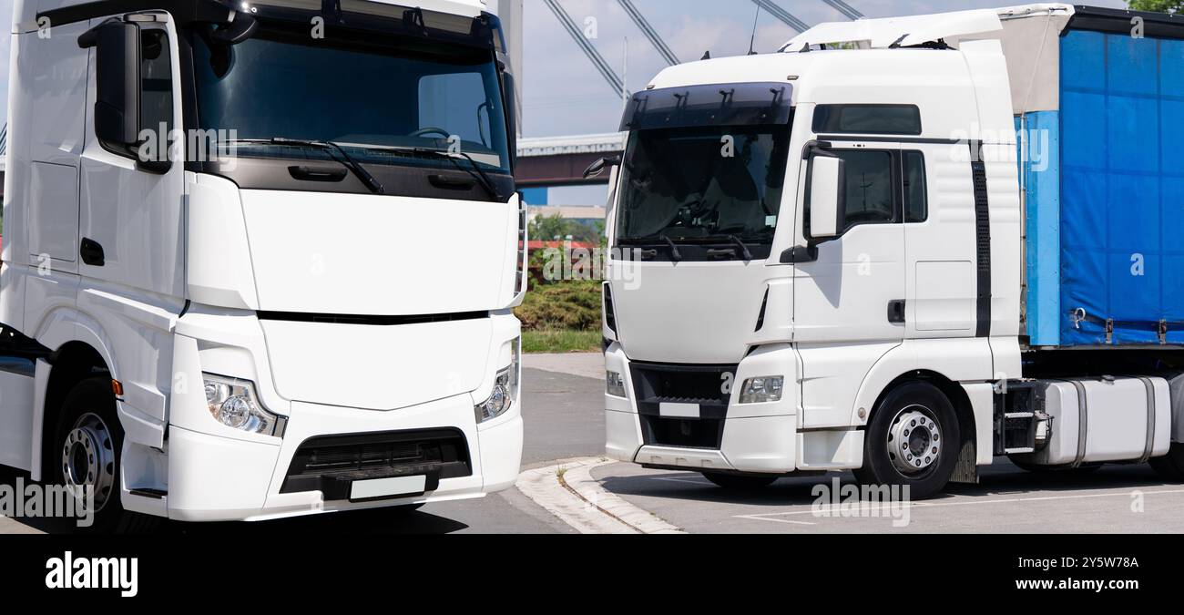 Semi truck fleet at the logistics center Stock Photo - Alamy