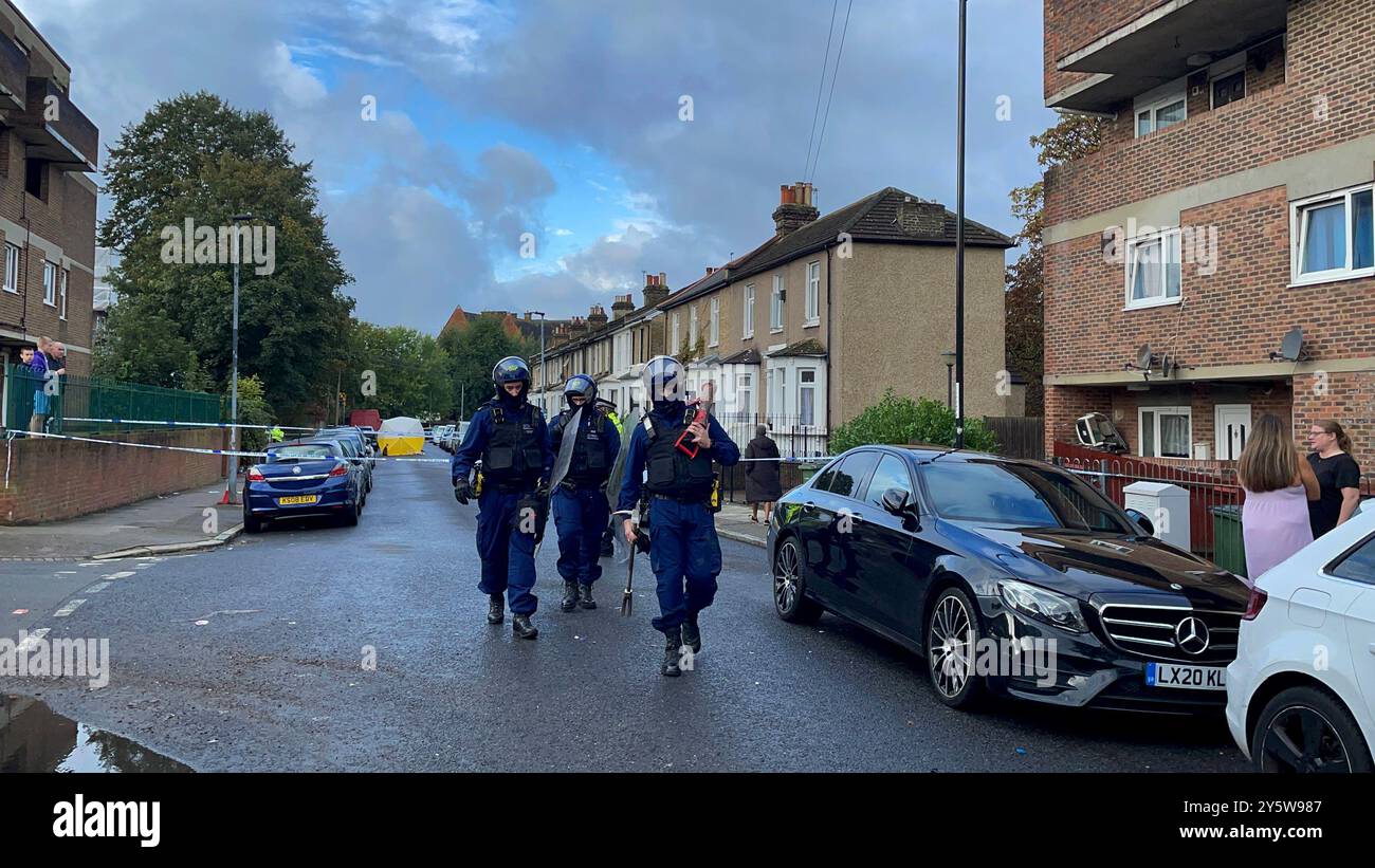Metropolitan Police Territorial Support Group officers at the scene in ...