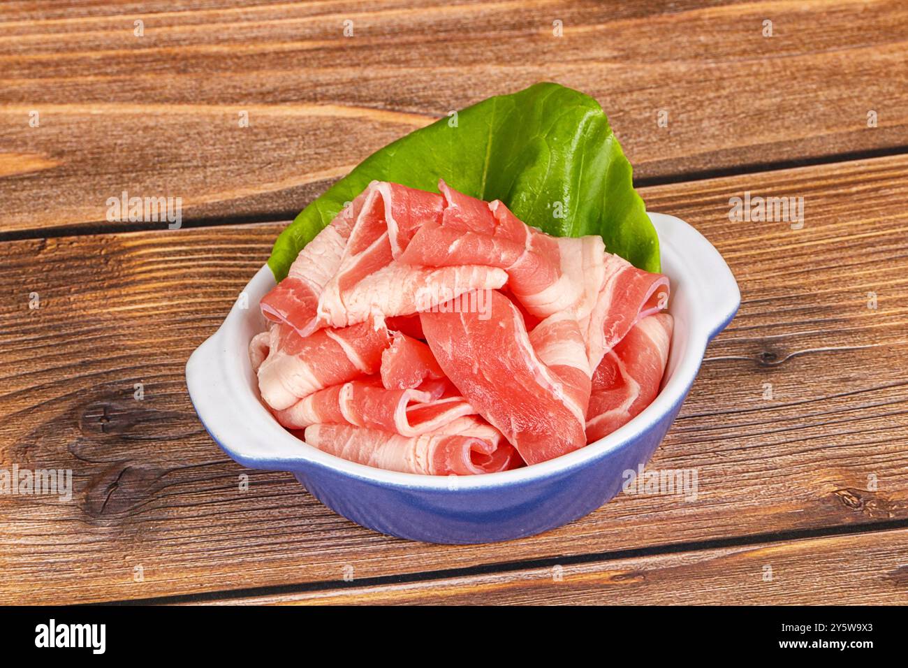 Sliced raw pork bacon in the bowl Stock Photo - Alamy