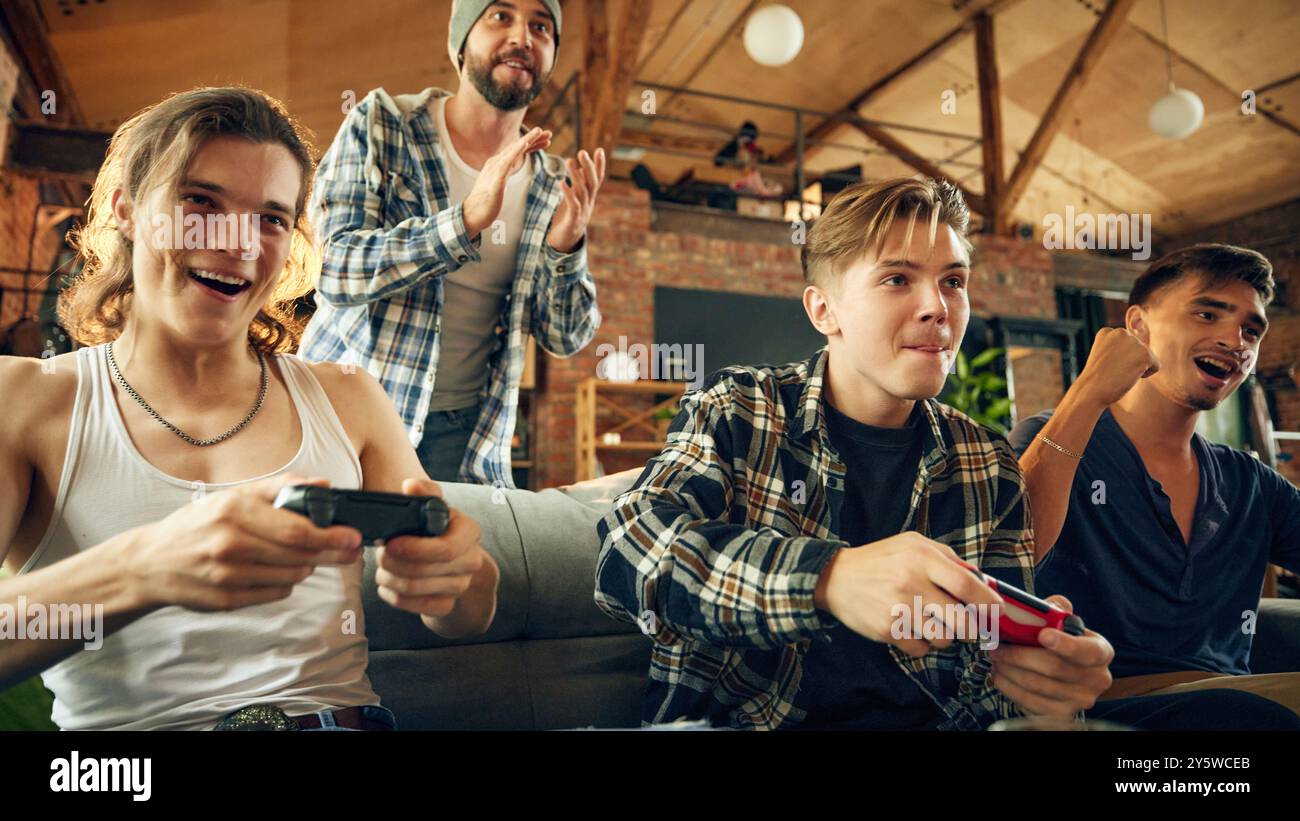 As game reaches its peak, laughter and cheers fill room. Camaraderie ...