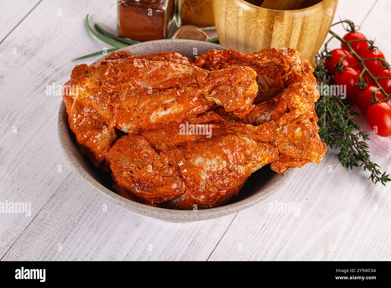 Raw turkey shoulder wing in Indian tandoori marinade spices Stock Photo ...