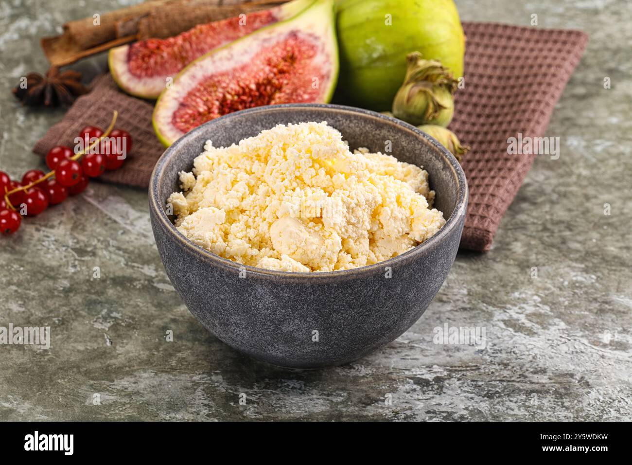 Delicous sheep cottage cheese curd served fig Stock Photo - Alamy