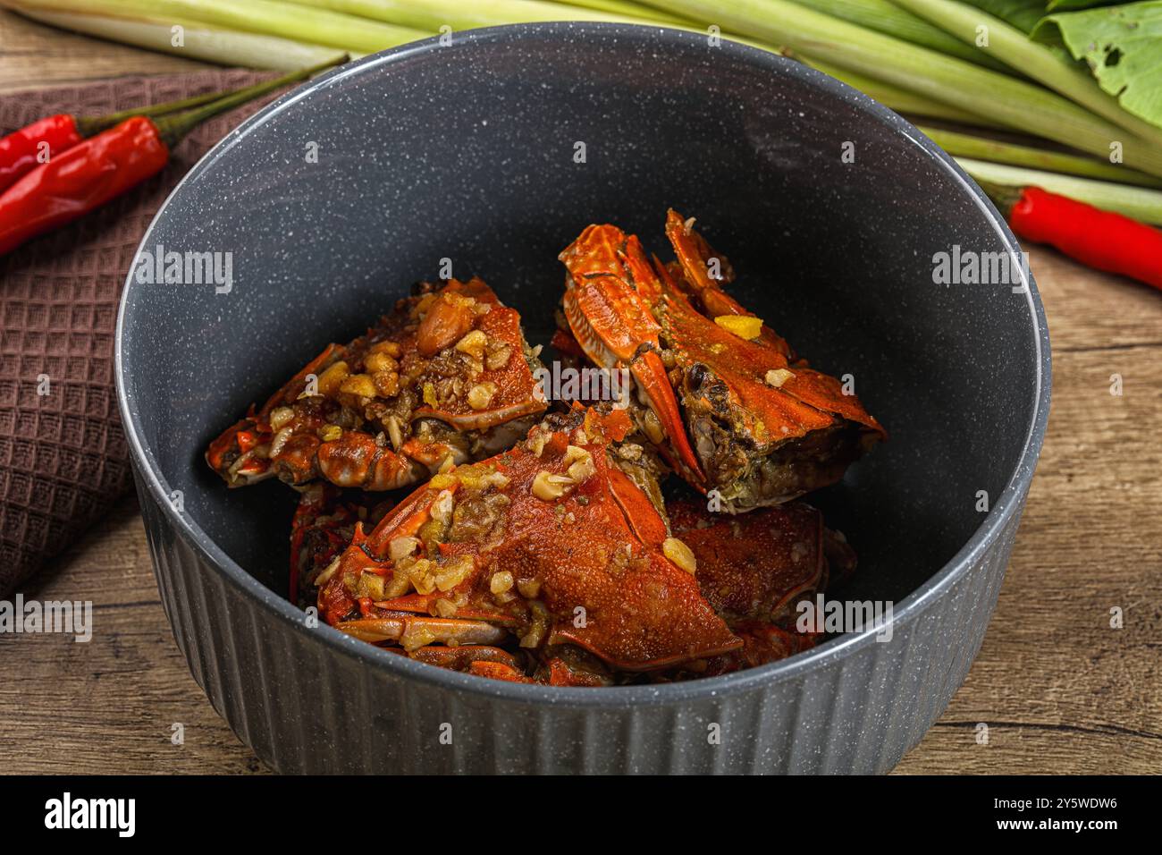 Tasty Steamed Spider crab Claws in tamatind sauce Stock Photo - Alamy