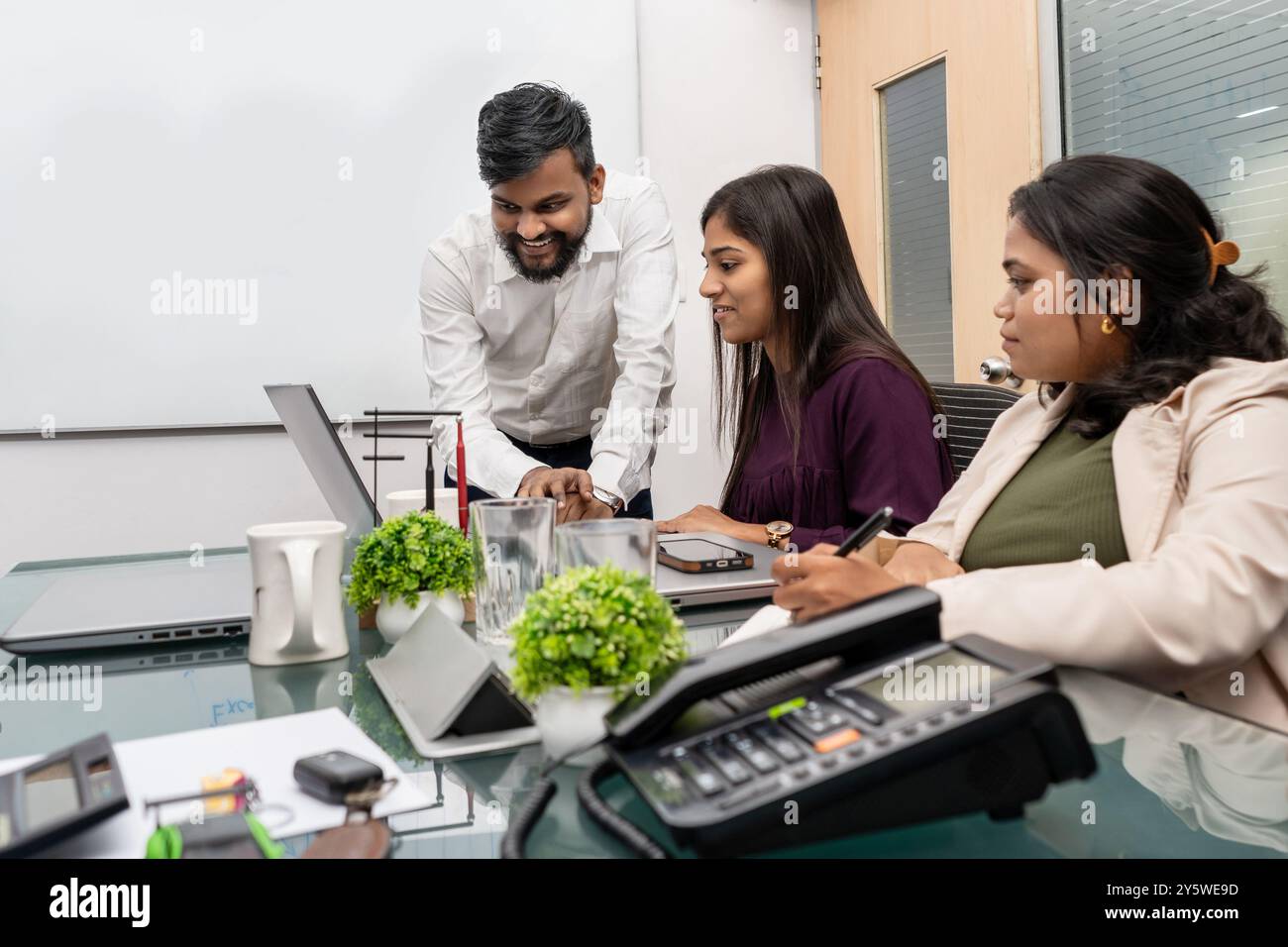 An Indian woman receiving corporate training from a highly professional ...