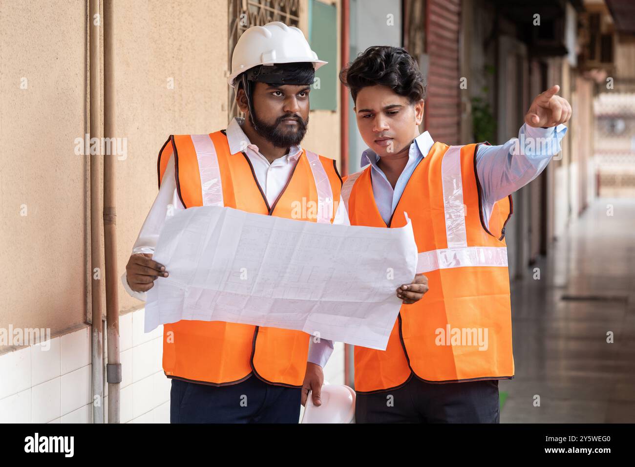 Professional engineers wearing safety gear hi-res stock photography and ...