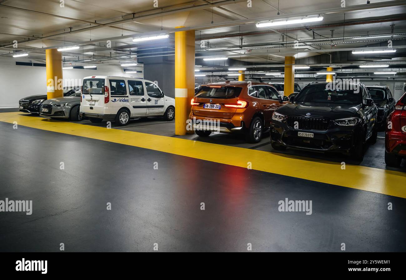 Basel, Switzerland - Sep 8, 2024: In a large underground parking lot in ...