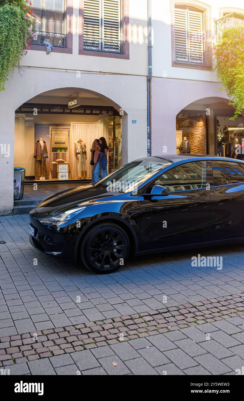 Strasbourg, France - Sep 20, 2024: A Tesla electric car driving through ...