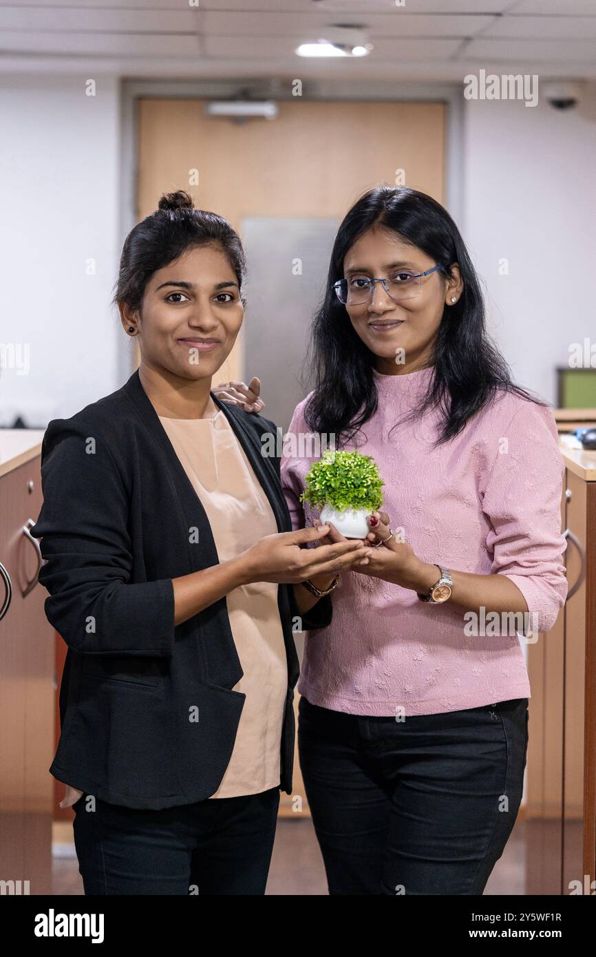 Two diverse professional Indian Females or women in corporate office ...