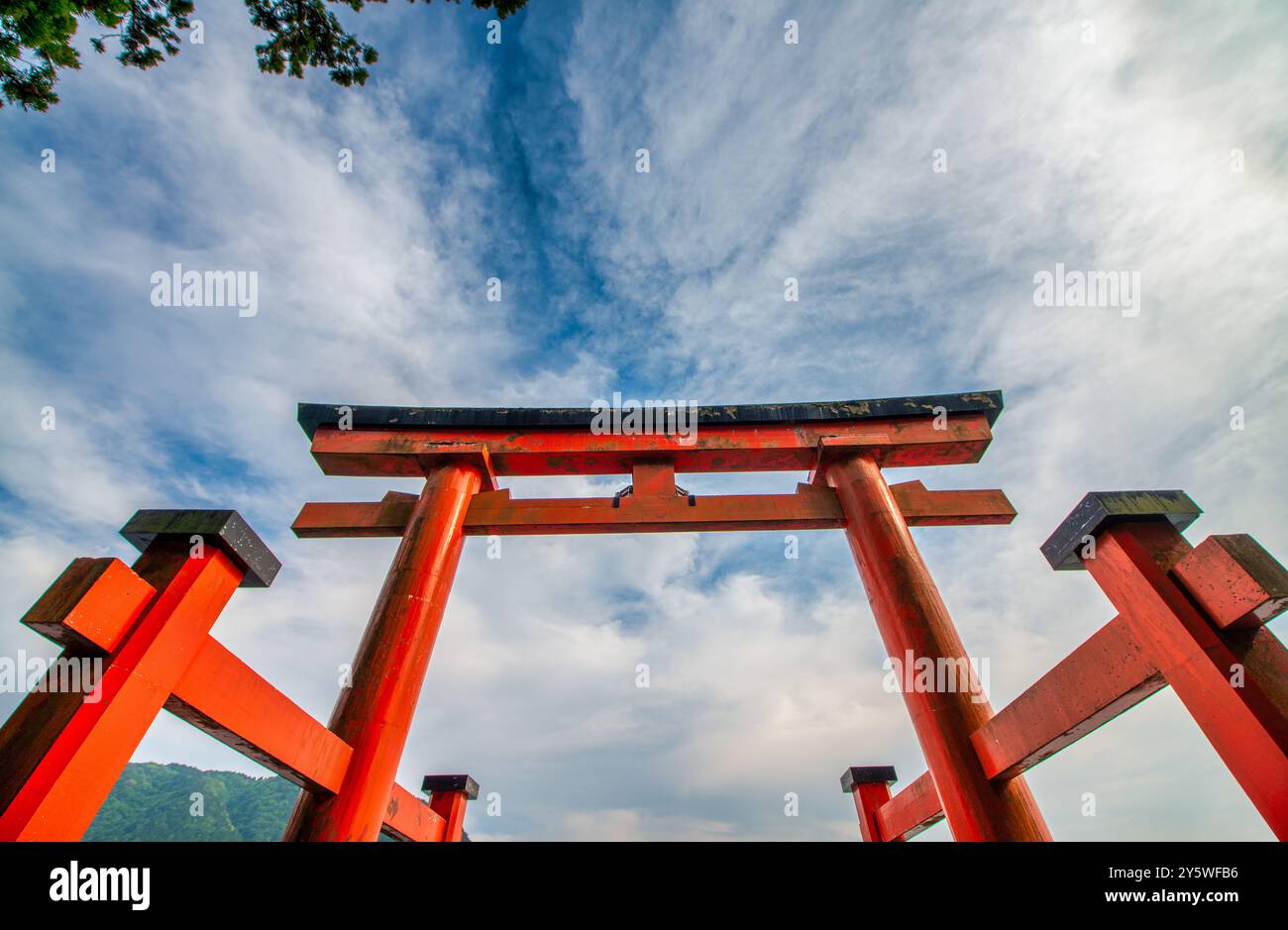 The red torii gate leading to Lake Ashi of Hakone Shrine in Motohakone ...