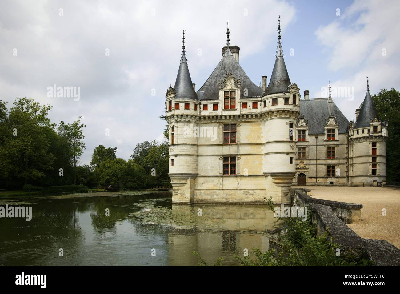 A classic French chateau built on a small island on the river Stock ...