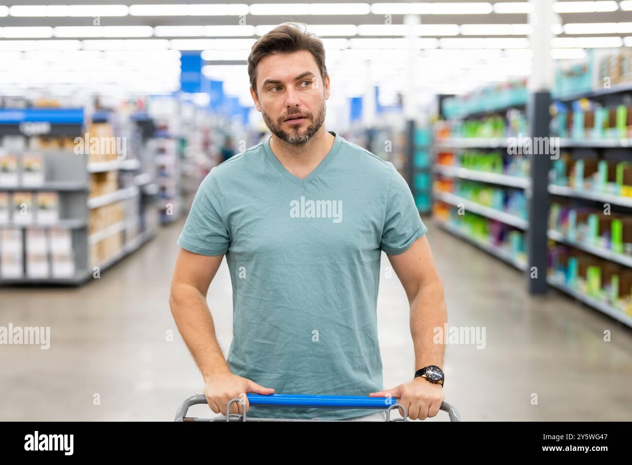 Man in shop, market store. Man shopping in supermarket. Sales, shop and ...