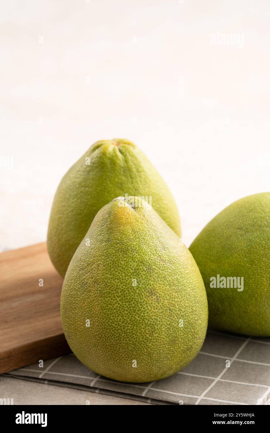 Fresh peeled pomelo with leaf on white table background for Mid-Autumn ...