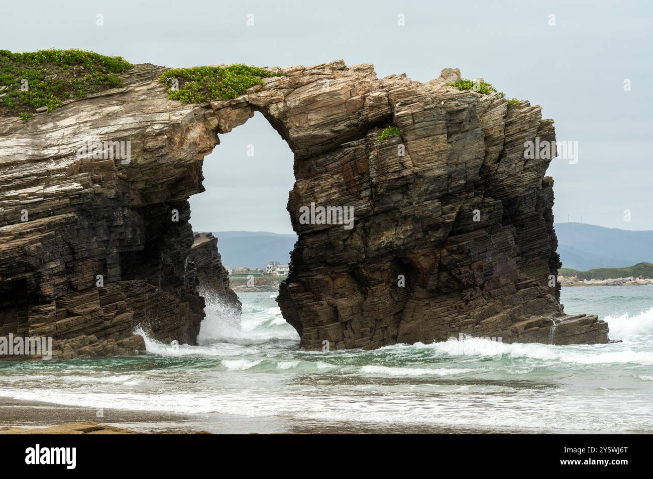 Natural Stone Archway Carved by the Ocean Waves Stock Photo - Alamy