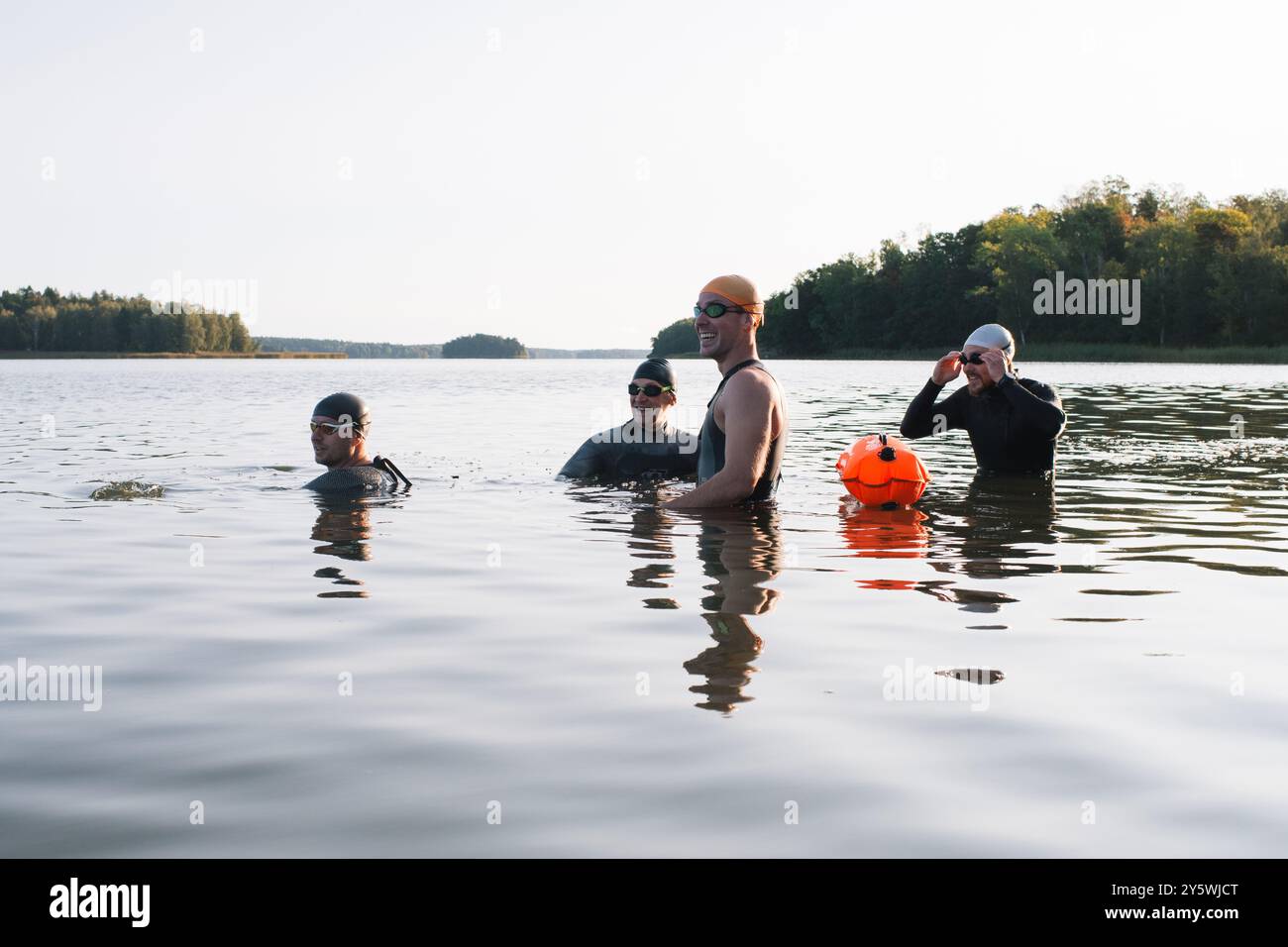 Swedish men laughing together whilst swimming in the baltic sea Stock ...