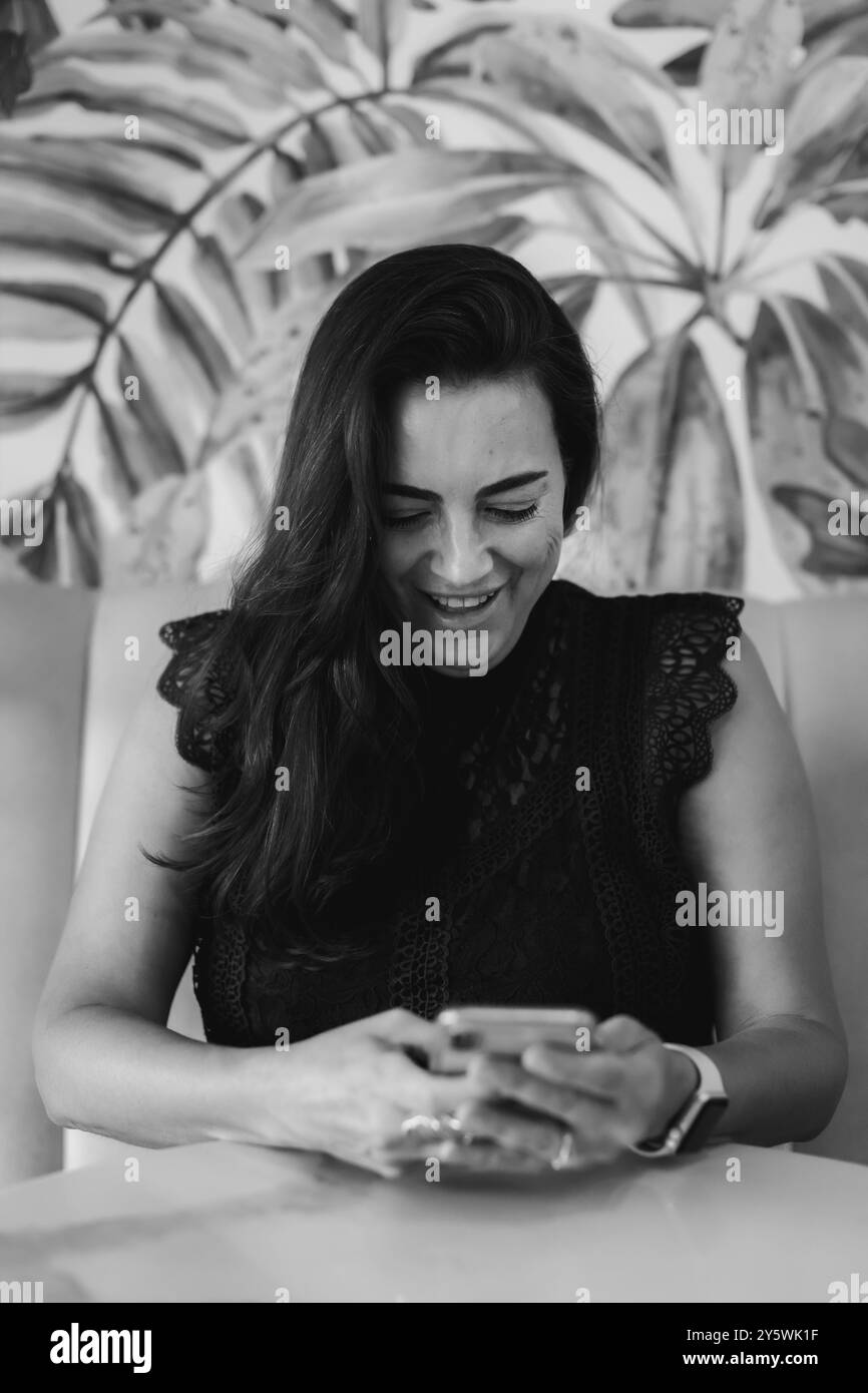 Positive woman in white Black and White Stock Photos & Images - Alamy