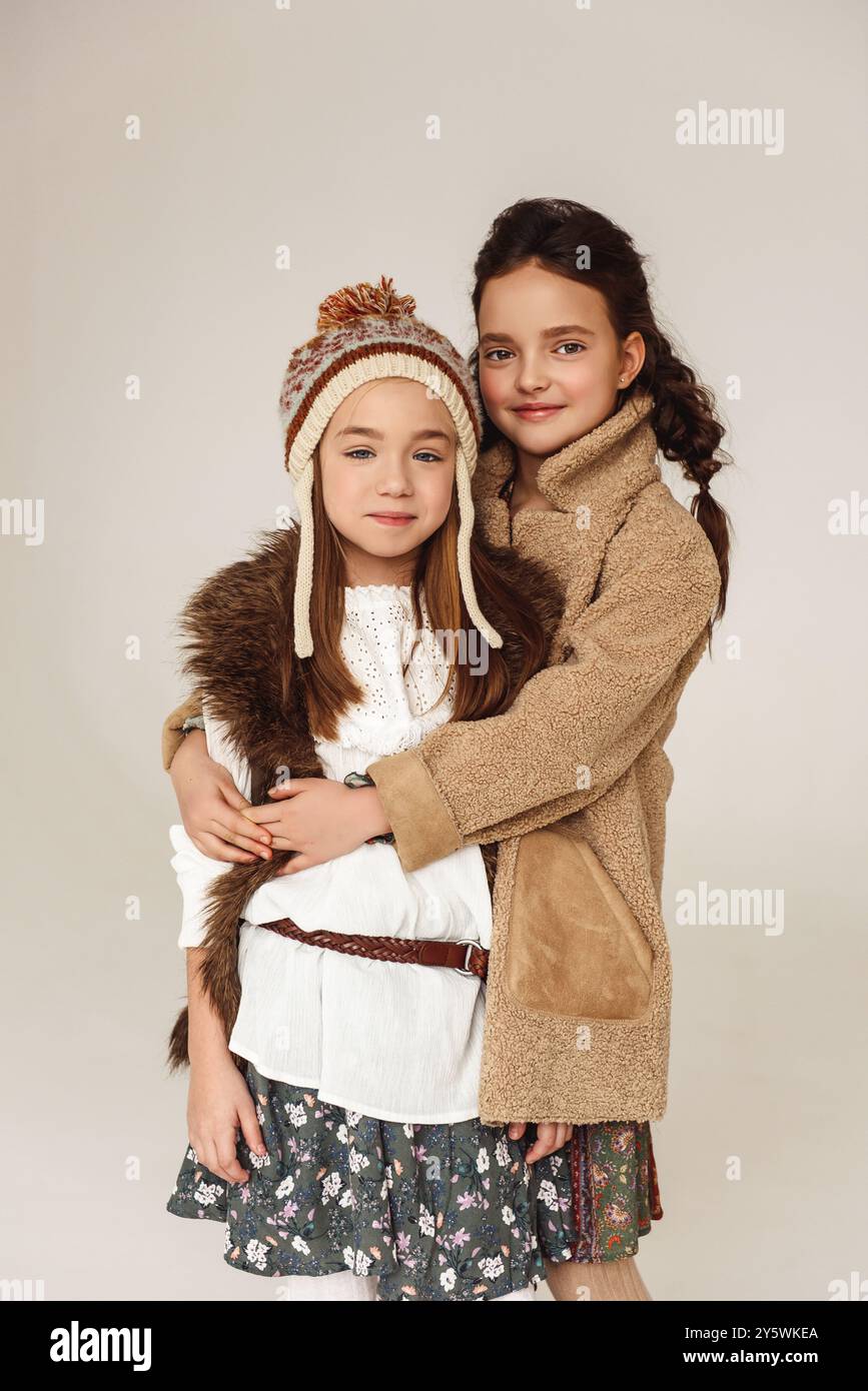 First-grader girls' girlfriends arm around Stock Photo - Alamy