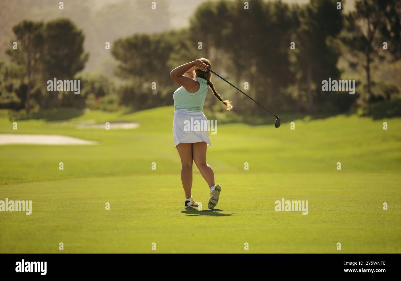 Female golfer powerful swing hi-res stock photography and images - Alamy