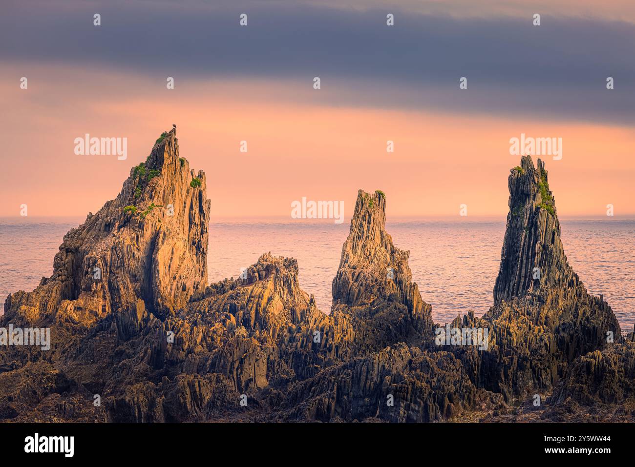 Sunrise on Gueirua Beach, a small pebbled bay that is notable for its ...