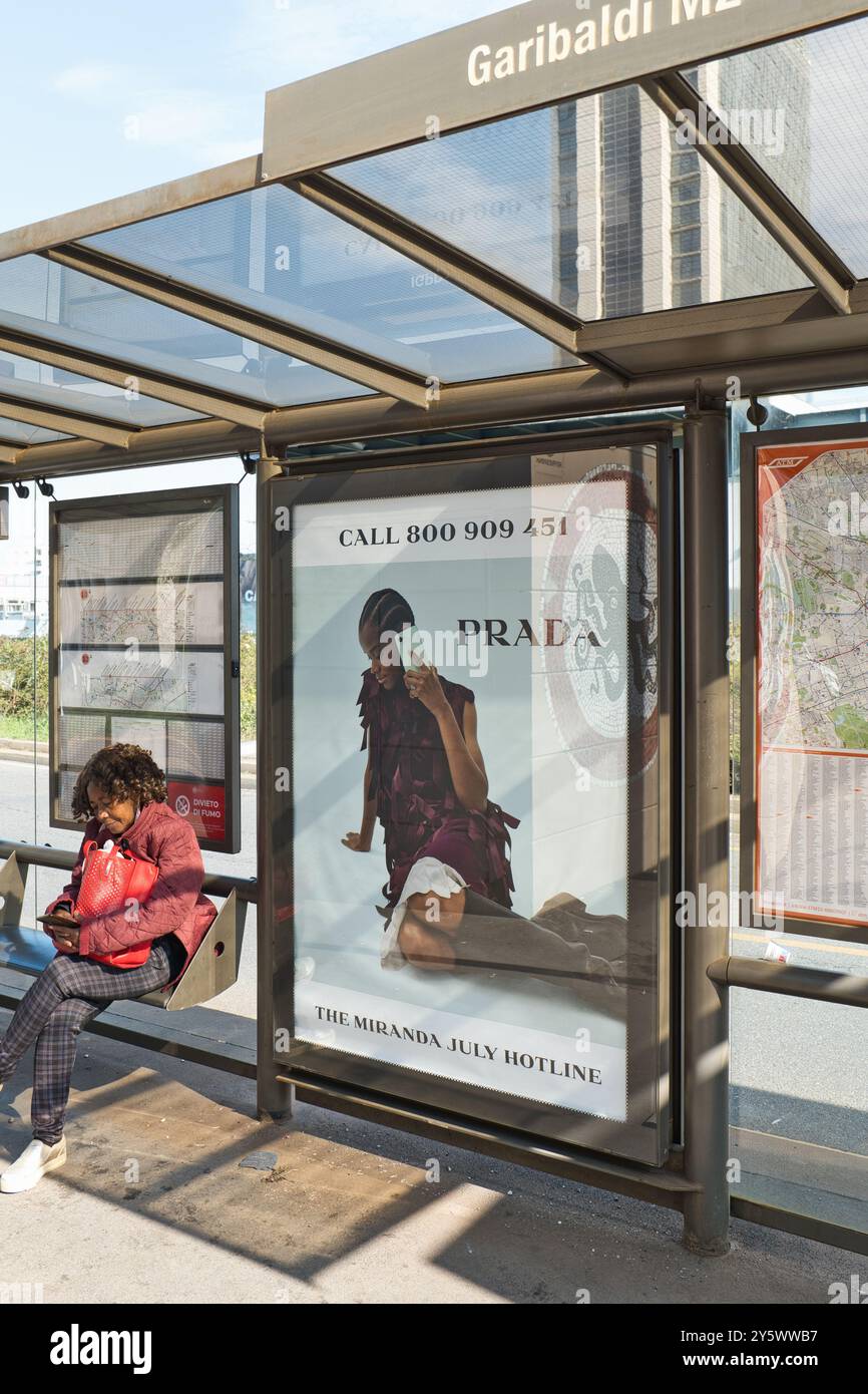 Prada billboard display at the tram stop, Milano, Italy fall 2024 Stock ...