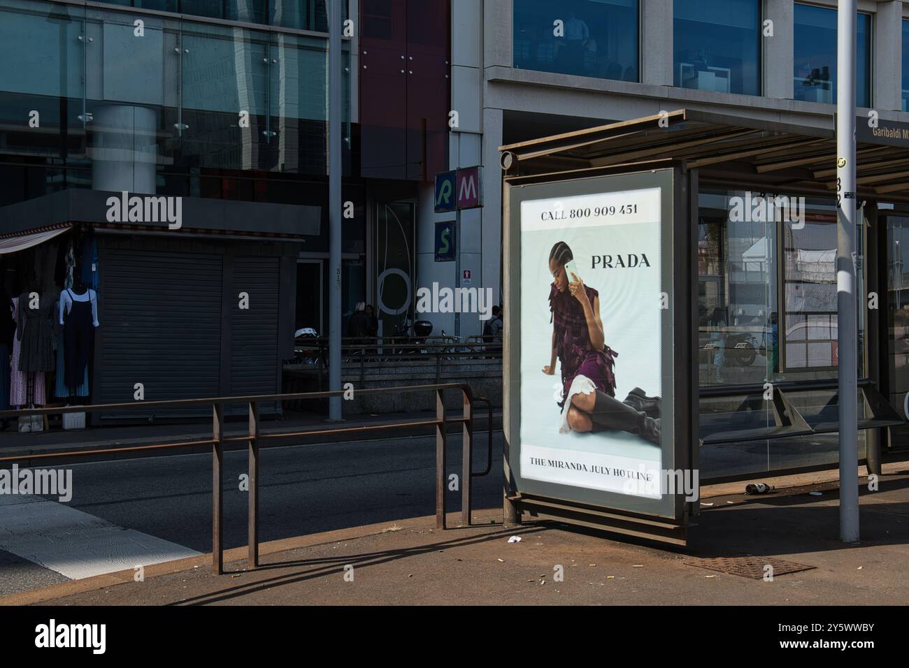Prada billboard display at the tram stop, Milano, Italy fall 2024 Stock ...