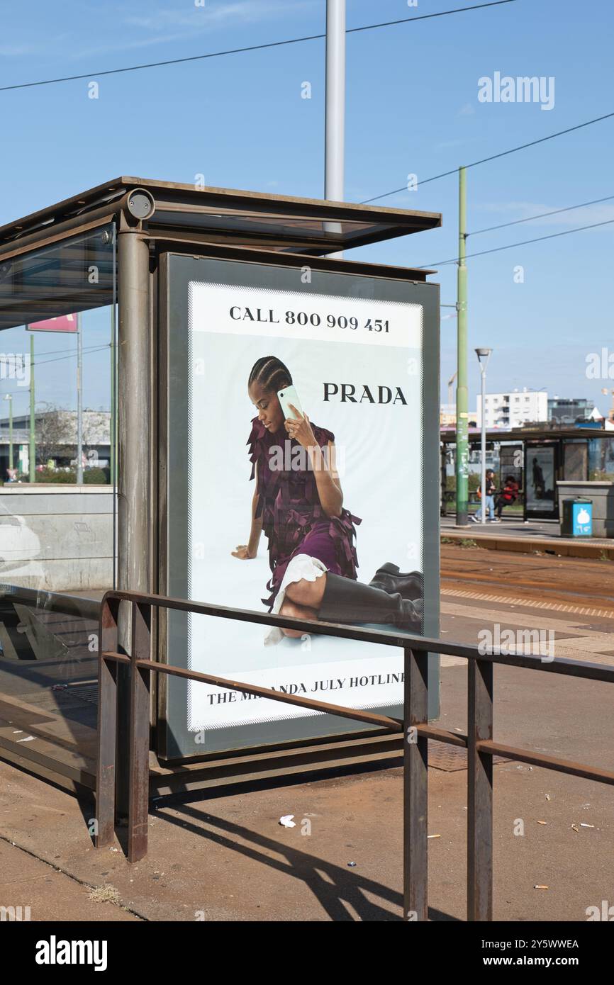 Prada billboard display at the tram stop, Milano, Italy fall 2024 Stock ...
