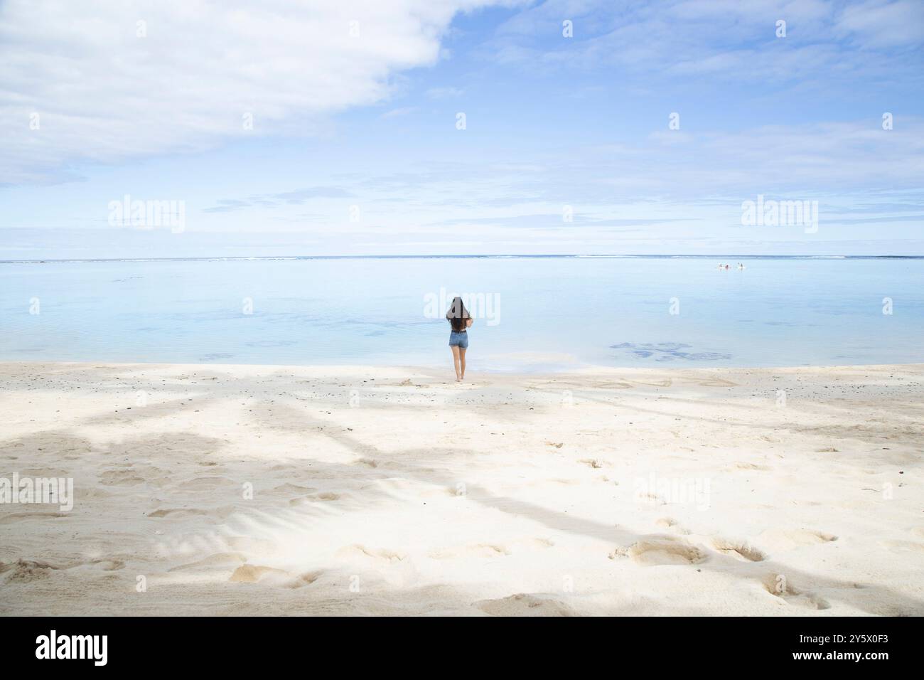 Figure stands waters edge hi-res stock photography and images - Alamy
