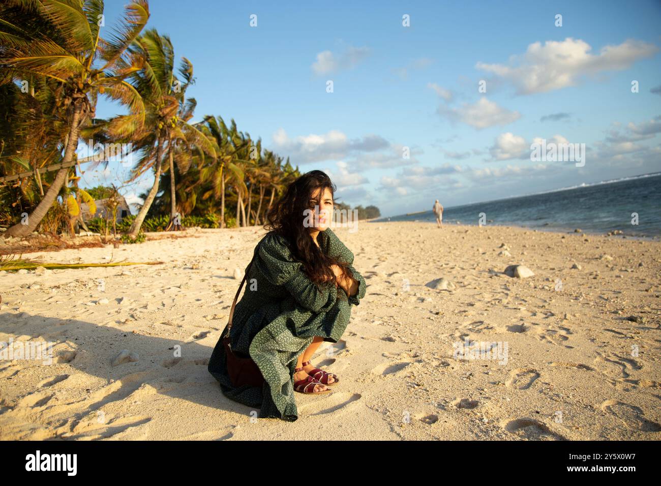 Person walking on a sandy beach hi-res stock photography and images - Alamy