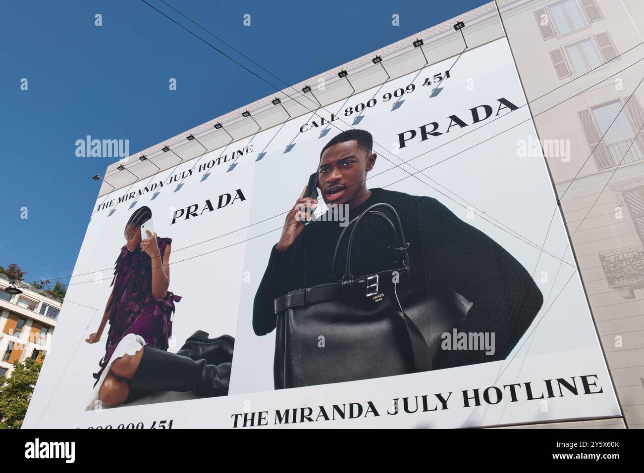Milano, Italy, fall 2024, wide advertising billboard of Prada brand in the center of the city ...