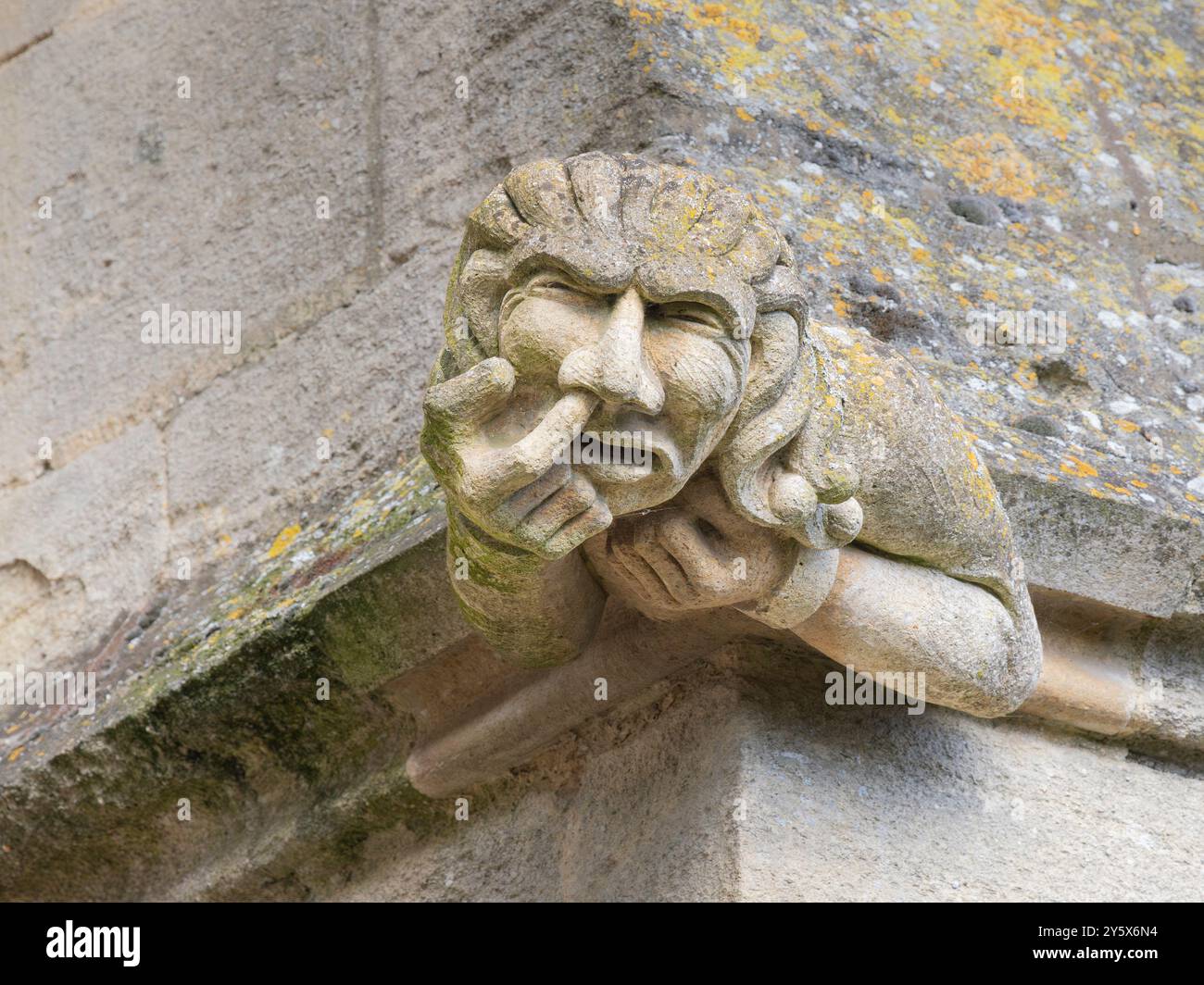 Carved stone grotesque figure picking nose on Ely Cathedral ...