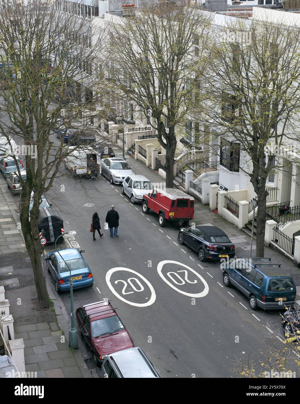 20mph speed limit signs painted on a residential road in Hove, East ...