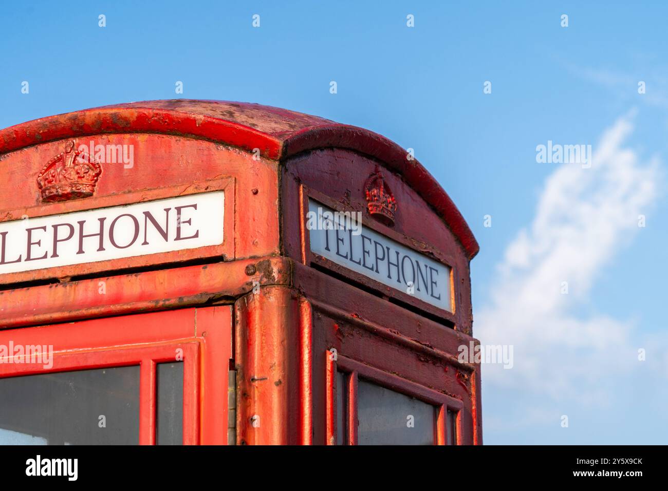 Traditional old red telephone box close up in England, United Kingdom ...