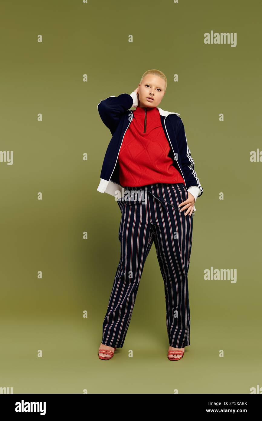 A young bald woman showcases bold fashion choices with striking colors ...